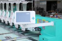 China 1200RPM Computer Flat Embroidery Machine 12 Head For Fabrice And Clothes for sale