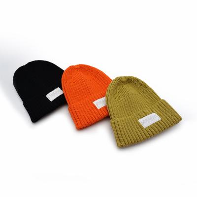 China Custom Knit Cuffed Acrylic Slouchy Beanie 58cm Streetwear Winter Skull Hat for sale