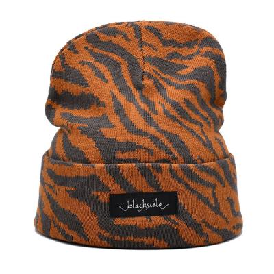 China Custom Logo Acrylic Jacquard Knit Beanie Hat 58cm Unisex Winter Warm Windproof for sale
