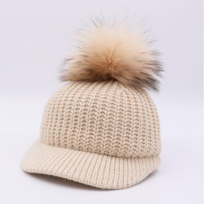 China Custom Wool Winter Baseball Beanie Hat with Real Raccoon Fur Pom Pom 58cm for sale