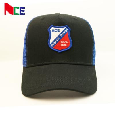 China Curved Brim 5 Panel Trucker Cap With Custom Logo Embroidered Patches for sale