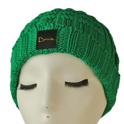 China Custom Logo Unisex Winter Knitted Beanie Hat 100% Acrylic One Size for sale