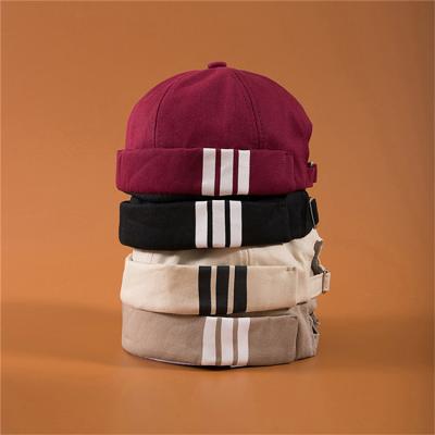 China High Quality Embroidered Rolled Caps,Customized Plastic Buckle Docker Caps,Washed Black Brimless Hats for sale