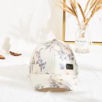 China Custom Metal Patch Curve Brim Baseball Cap Six Panels Floral Pattern 56-60cm Adult Size for sale
