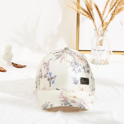 China Custom Metal Patch Curve Brim Baseball Cap Six Panels Floral Pattern 56-60cm Adult Size for sale