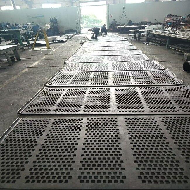 Rubber belt tracking on vacuum belt filter rollers