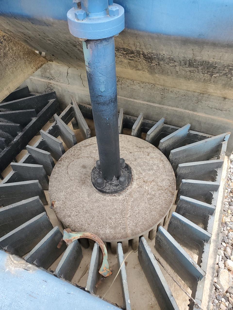 Worn flotation rotor and stator assembly showing abrasive wear from mineral slurry service.
