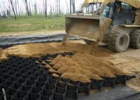 China Textured Surface HDPE Geocell Retaining Wall Black Color Lightweight With Hole for sale