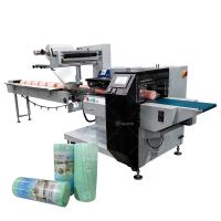China 400KG Weight Multi-Function Chocolate Foil and Paper Wrapping Machine with Conveyor for sale