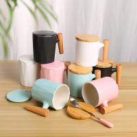 China Hot sale wood handles tea cups cups high quality custom gift ceramic coffee cups wood handle coffee mug porcelain mug 30 for sale