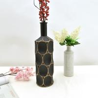 China High quality creative bottle shape black luxury Polyresin vase for party table decor for sale