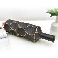 China High quality creative bottle shape black luxury Polyresin vase for party table decor for sale