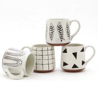 China Ceramic Handmade Cups Unique Geometric Smart Black And White Ceramic Coffee Mug For Gift for sale