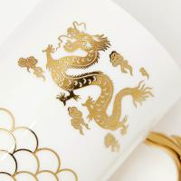 China Custom Ceramic Mug Gold Handle Mug With Dragon Pattern for sale