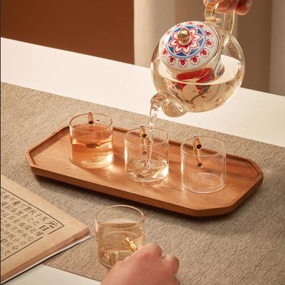 China Ready To Ship In Stock Customized Glassware Teapot Set With Ceramic Inner Container One Teapot And Four Cups for sale