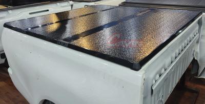 China Aluminium Alloy Tri-Fold Tonneau Cover for Toyota Hilux Revo Vigo - 20 Sets MOQ with 1-Year Warranty for sale