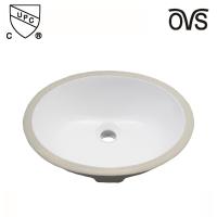 China Oval Shape Undermount Bathroom Sink Fine Fireclay Construction One Piece Wash Basin for sale