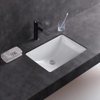 China Sleek Lines And Soft Curves Wholesale Undermount Ceramic Basin Sink for sale