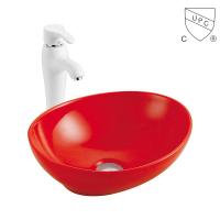 China Sleek And Elegant Oval Ceramic Art Bathroom Sink Counter Top Wash Basin for sale