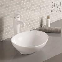 China Sleek And Elegant Oval Ceramic Art Bathroom Sink Counter Top Wash Basin for sale