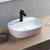 China Concise Clear Counter Top Bathroom Sink High-Temperature Firing Wash Basin for sale