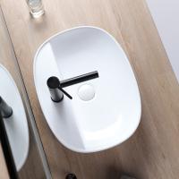 China Concise Clear Counter Top Bathroom Sink High-Temperature Firing Wash Basin for sale