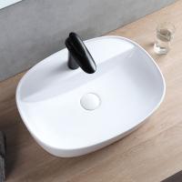China Concise Clear Counter Top Bathroom Sink High-Temperature Firing Wash Basin for sale