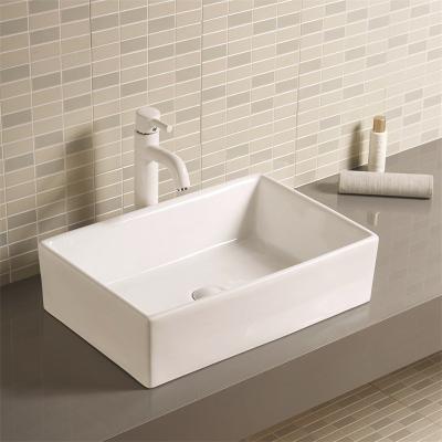 China Smooth Counter Top Bathroom Sink Exquisite And Strong Ceramics Rectangular Wash Basin Design for sale
