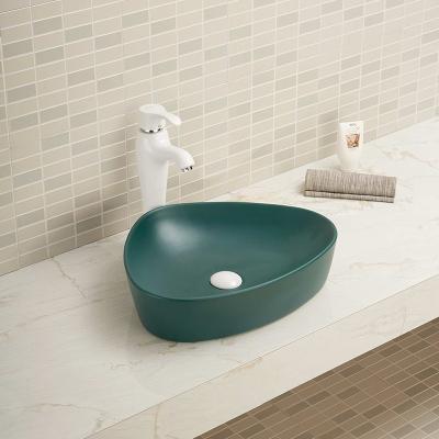 China Low Water Absorption Counter Top Bathroom Sink Green Color Irregular Basin for sale
