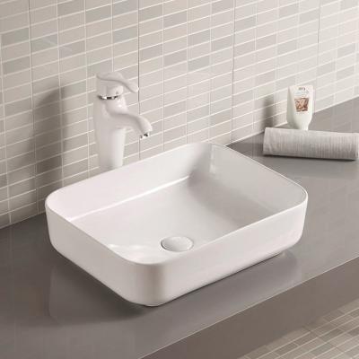 China Solid Smooth Counter Top Bathroom Sink Ceramic Easy Maintain Rectangular Wash Basin for sale