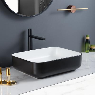 China Delicate Solid Counter Top Bathroom Sink Impact-Resistance Rectangular Hand Basin for sale