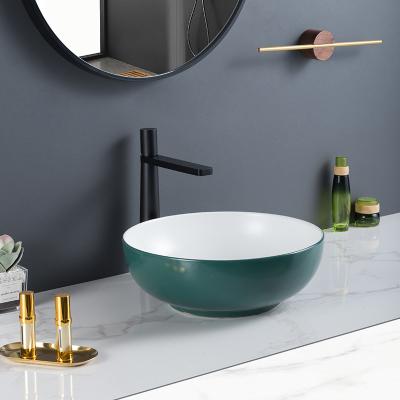 China Polished Surface Counter Top Bathroom Sink Smooth Easily Maintain Round Ceramic Basin for sale