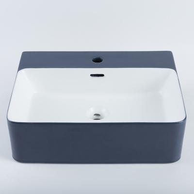 China Easy Maintain Rectangular Vessel Sink With Overflow Ceramic Basin Price For Hotel for sale