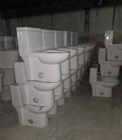 China American Standard Cosette Dual Flush Elongated One Piece Toilet In White 1.28 Gpf for sale