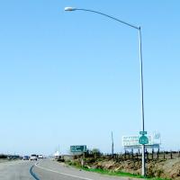 China Single Arm Bracket Galvanized Steel Roadway And Highway Street Light Pole for sale