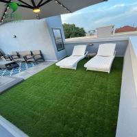 China Commercial Artificial Grass Turf Tile Interlocking Design 3/8 inch Gauge DIY Pet Lawn Mat for sale
