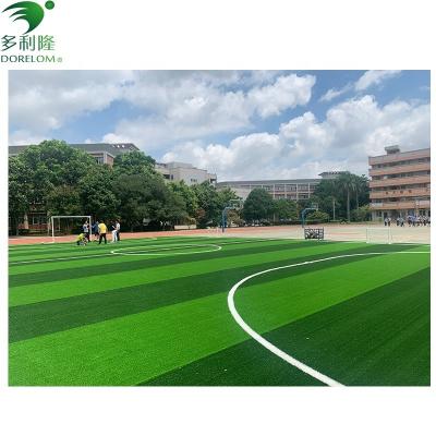 China Yellow Green Red Artificial Turf Grass Tiles for Football Garden and Sports Flooring for sale