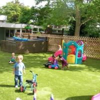 China 25mm Pile Height 3/8 Inch Gauge Artificial Grass Lawn Perfect for Children Playground for sale