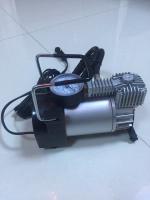 China Silver And Yellow Car Tyre Pressure Pump , Heavy Duty Power 12 Volt Air Compressor for sale
