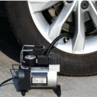 China Portable High Pressure  Metal Car Air Compressor With Watch And Cloth Bag for sale