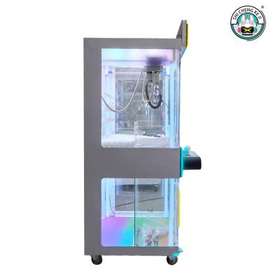 China Coin Operated Gift Game Spin Toys Clips Clamp Machine Mini Claw Toy Crane Machines for sale