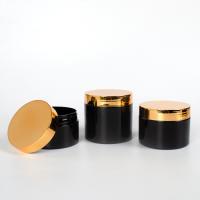 China Wide Mouth PET Round Plastic Canisters 100ml Black Cosmetic Jars With Gold Lid for sale