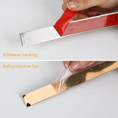 China Metal Stainless Steel Adhesive Roll Flat Tape with Hairline Finish PVD Color Coating and 201 Grade for Tile Edges for sale
