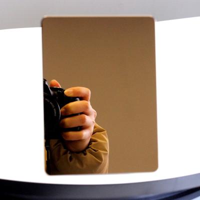 China Chocolate Gold Mirror Finish Decorative Stainless Steel Sheet with 0.3-1.2mm Thickness and 1219x2438mm Size for sale