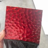China Honeycomb Design China Red Mirror Embossed Stainless Steel Sheet with 0.85mm Thickness for Decorative Use for sale