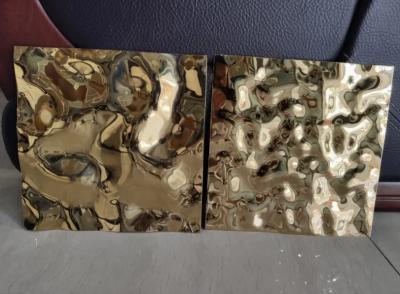 China 304 Grade Gold Mirror Finish Water Ripple Stainless Steel Sheet with 0.65mm Thickness for Decorative Applications for sale