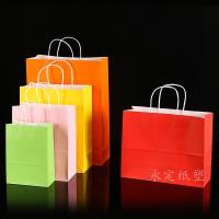 China Industrial Surface Packaging Kraft Paper Gift Bag with Handle Customized Logo Printing for sale