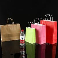 China Industrial Surface Packaging Kraft Paper Gift Bag with Handle Customized Logo Printing for sale
