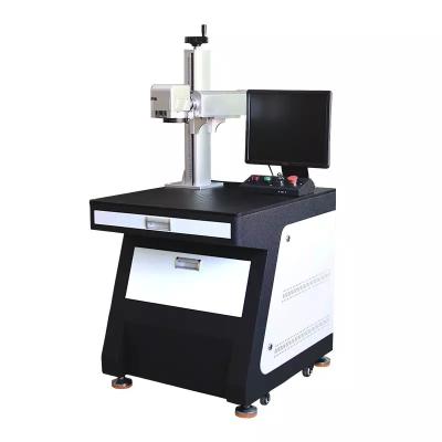 China Hand Held 120W 50Hz Metal Fiber Laser Engraving Machine With Table for sale
