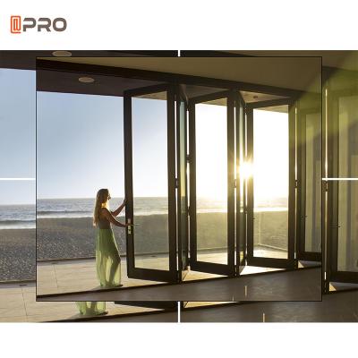 China Non Thermal Break Accordion Aluminum Bi Folding Door Exterior Patio Fold Doors for sale